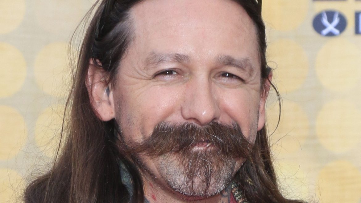 Oliver Peck : le Maître du Tattoo et son Record Étonnant - Obscura